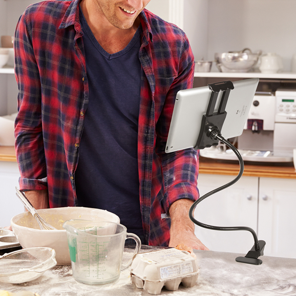Tablet stand with moveable arms
