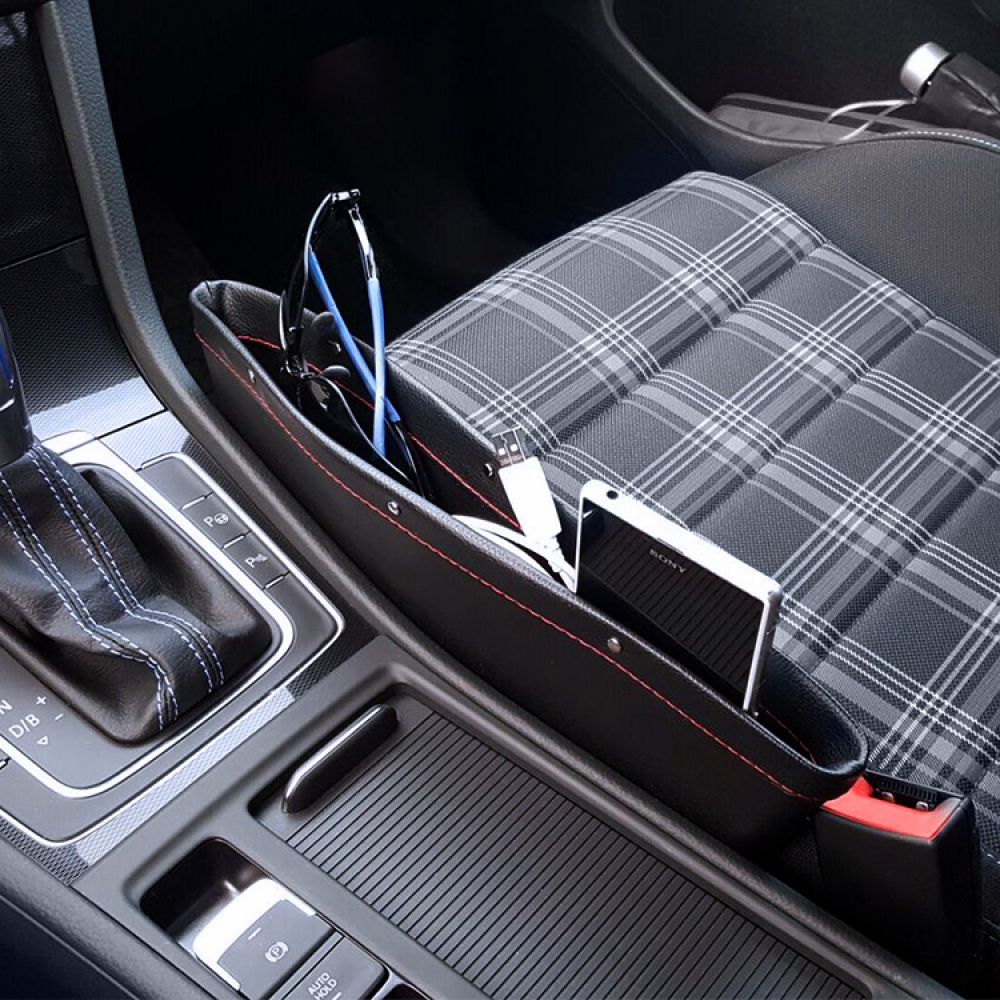 Car seat compartment for front seat storage